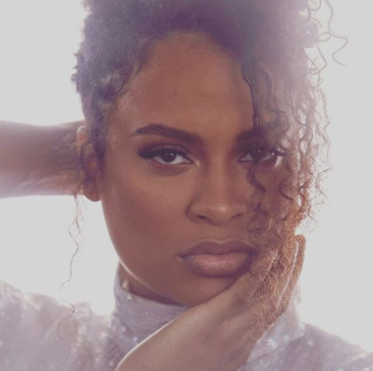 Nicole Bus Earns First No. 1 R&B Hit - Rated R&B