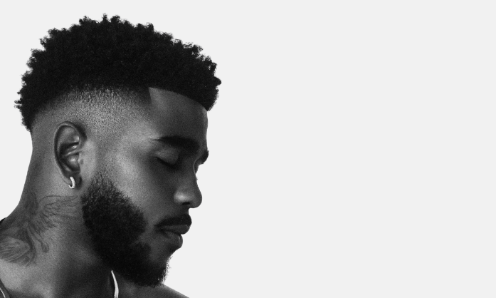 TA Thomas Releases Debut EP 'Caught Between 2 Worlds'